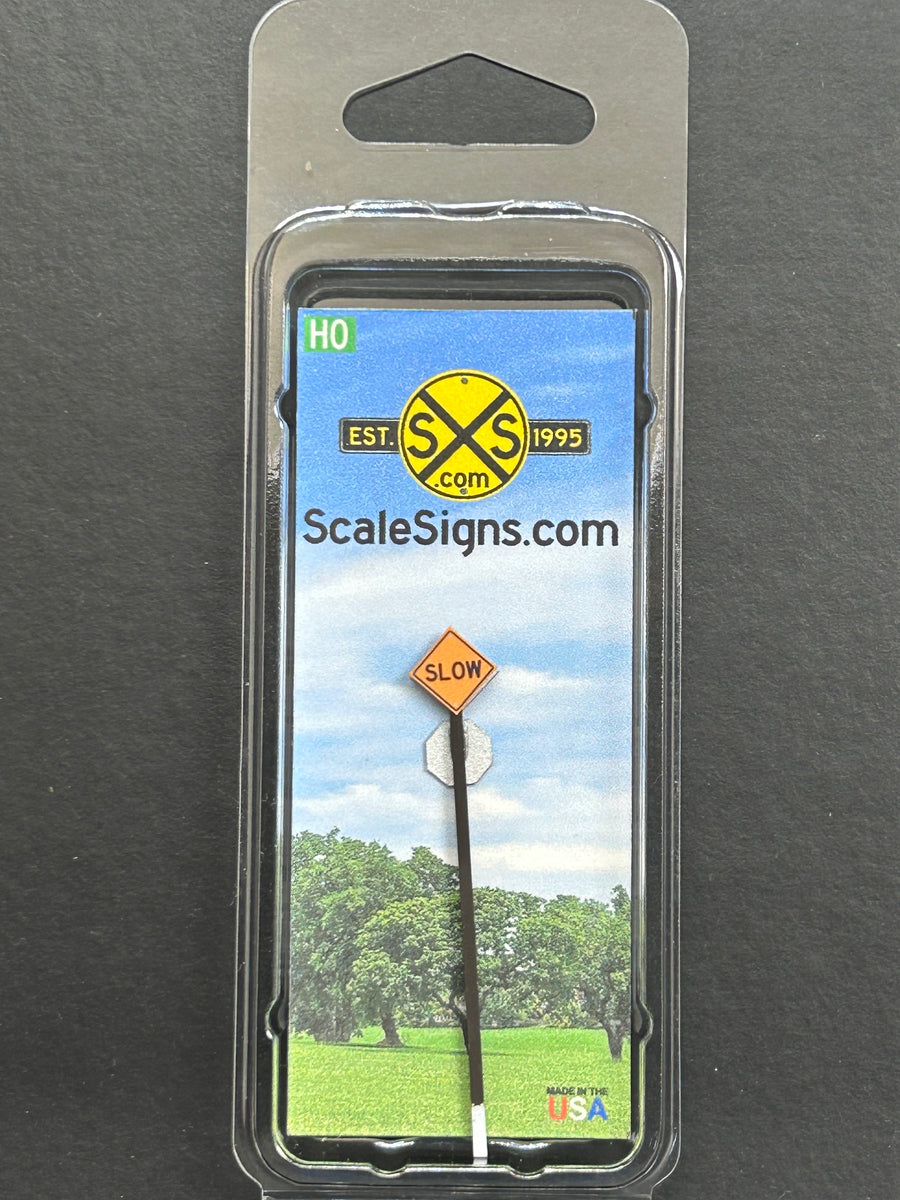 🟢 Flagger Stop & Slow Sign| ScaleSigns.com